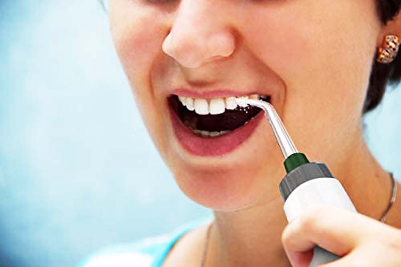 Irrigador dental potente