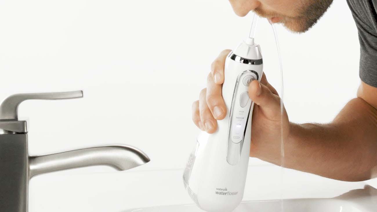 Irrigador dental recargable
